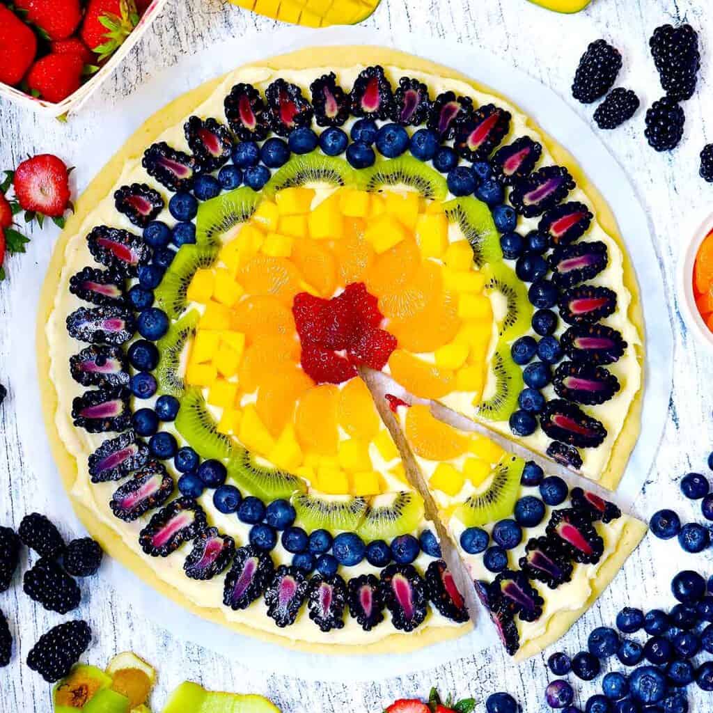 Rainbow Fruit Pizza with Sugar Cookie Crust - Bowl of Delicious