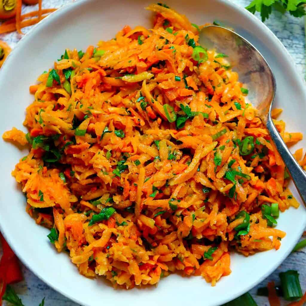 Shredded Carrot Salad with Herbs and Dijon Vinaigrette - Bowl of Delicious