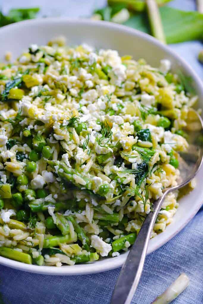 Lemony Orzo with Spring Vegetables, Garlic, and Herbs - Bowl of Delicious